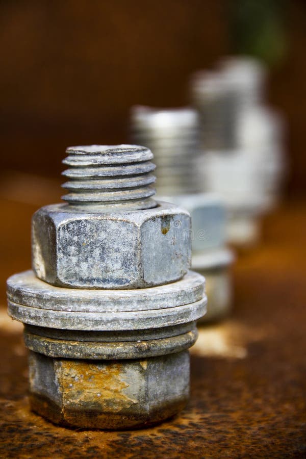 Four Silver Screws on Rusty Metal Plate Stock Photo - Image of detail ...