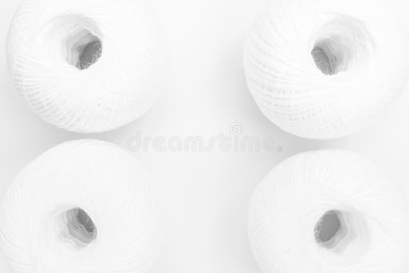 Four Skeins of White Thread on White Background, Abstract Background ...