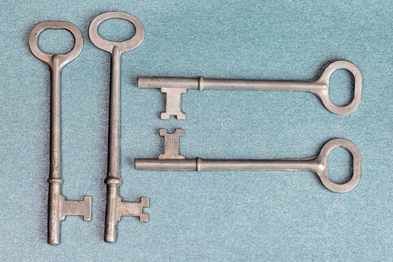 Four Skeleton Keys on a Blue Background Stock Image - Image of rustic ...