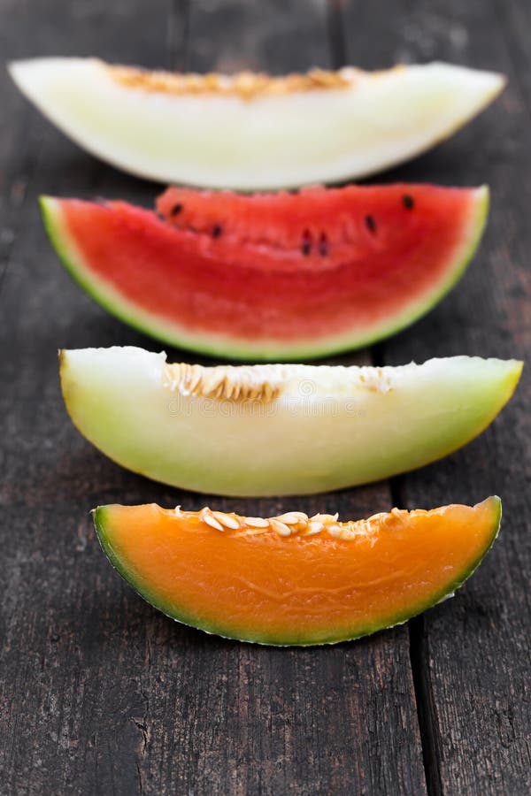 Four slices of melons stock image. Image of citrullus - 145846259