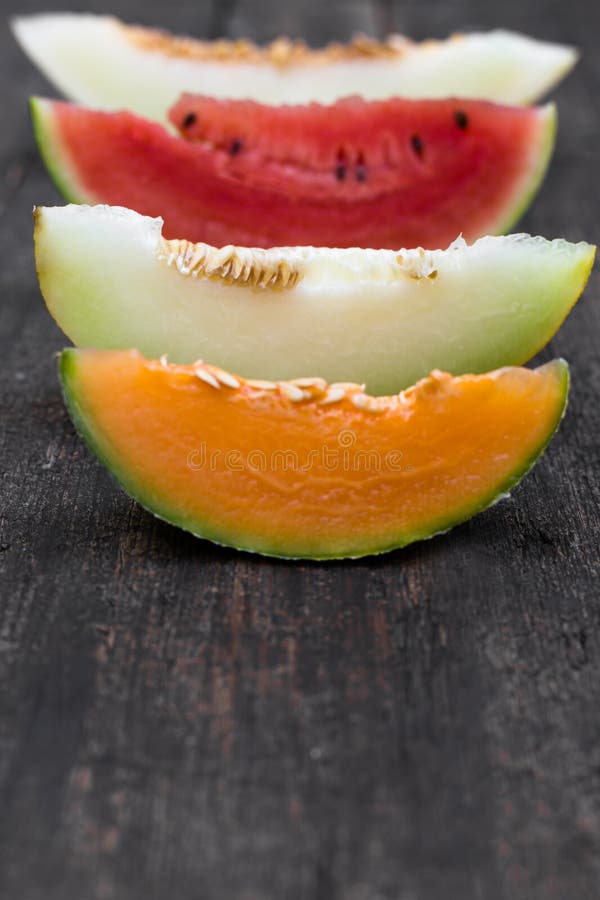Four slices of melons stock image. Image of hami, green - 76156939