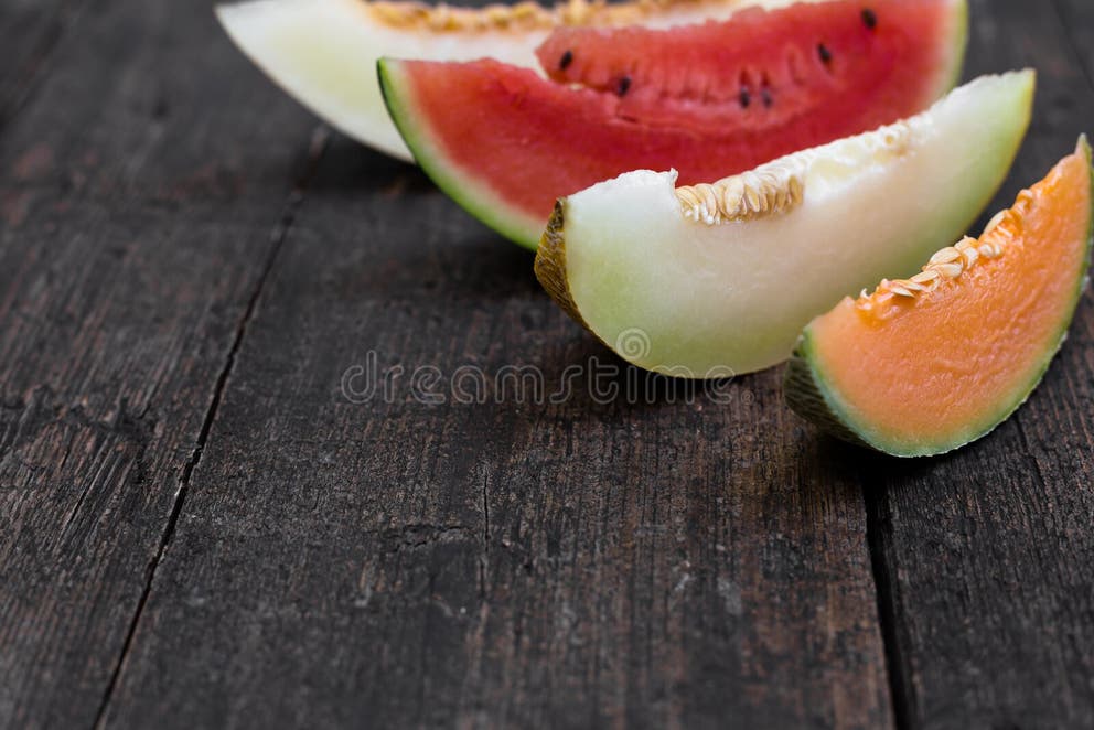 Four slices of melons stock photo. Image of cantaloupe - 91848182