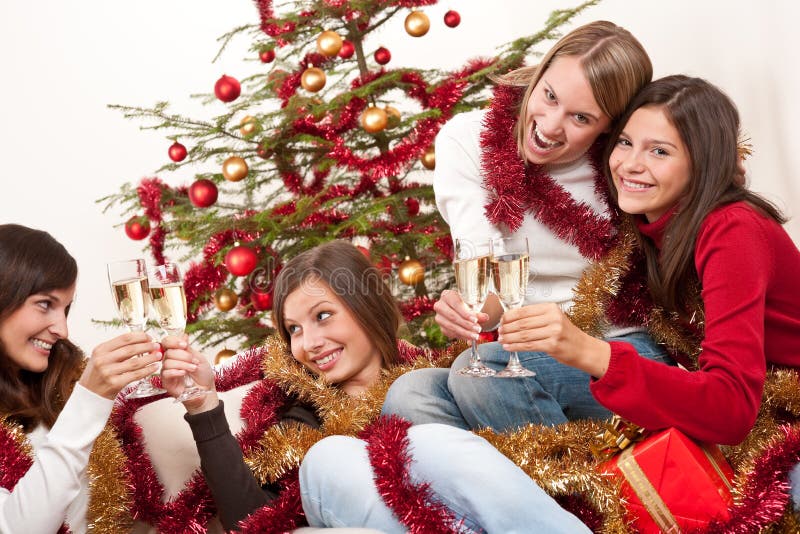Four Smiling Women on Christmas Stock Photo - Image of event, smiling ...