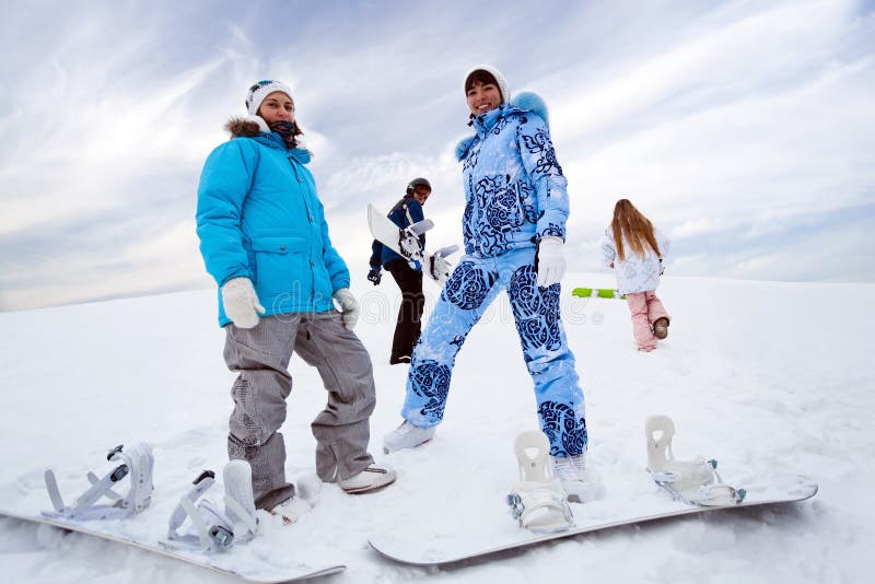Four Snowboard Riders on Hill Stock Image - Image of casual, caucasian ...