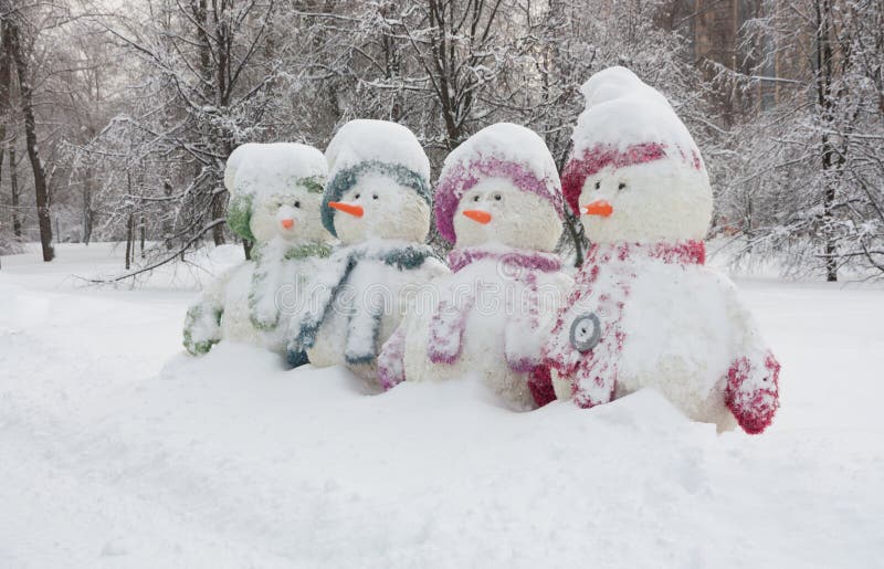 Four snowmen stock image. Image of seasonal, winter, white - 7009579