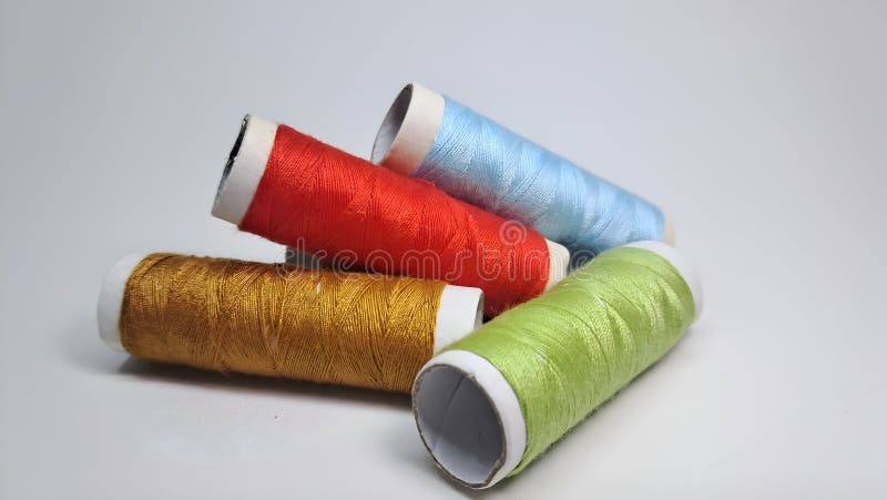 Four Spools of Thread with Different Colors Stock Image - Image of blue ...
