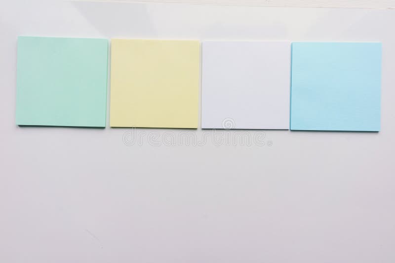 Four Square Sheet of Paper on a White Background. Top View Stock ...