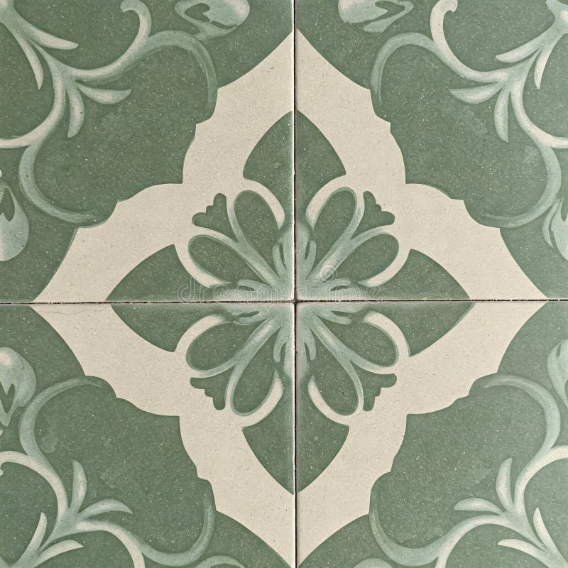 Four Square Tiles with a Repeating Stylized Floral Pattern in Muted ...