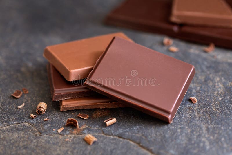 Two Squares of Dark Chocolate Isolated on White. Stock Photo - Image of ...