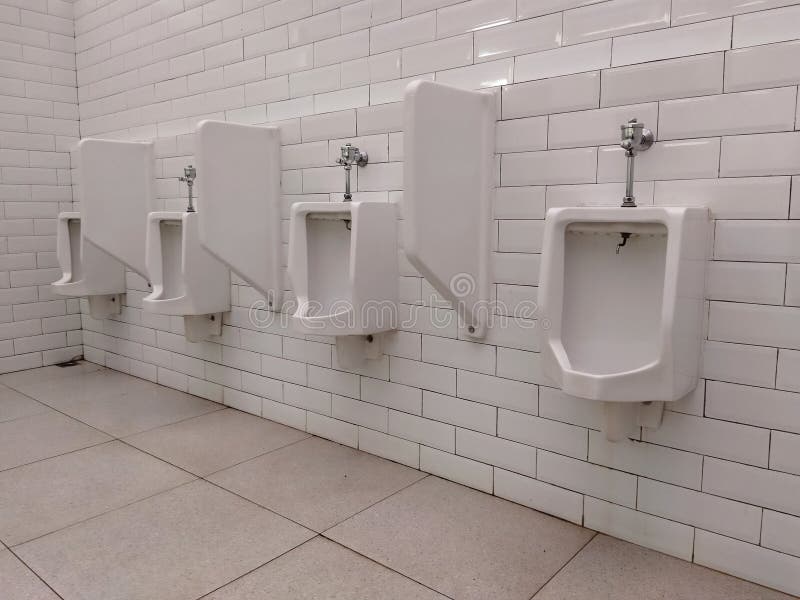 Four Standing Toilets for Men, Simple Minimalist White. Angle at Eye ...