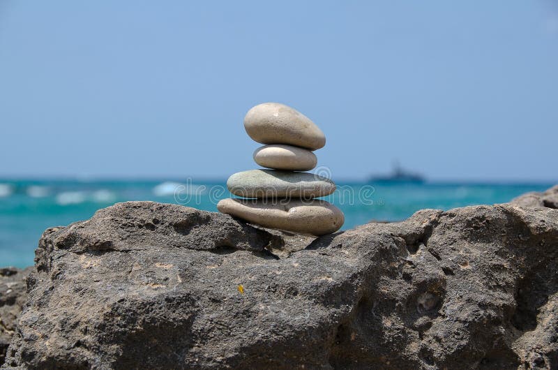 Four stones stock image. Image of waves, stacked, water - 25010095