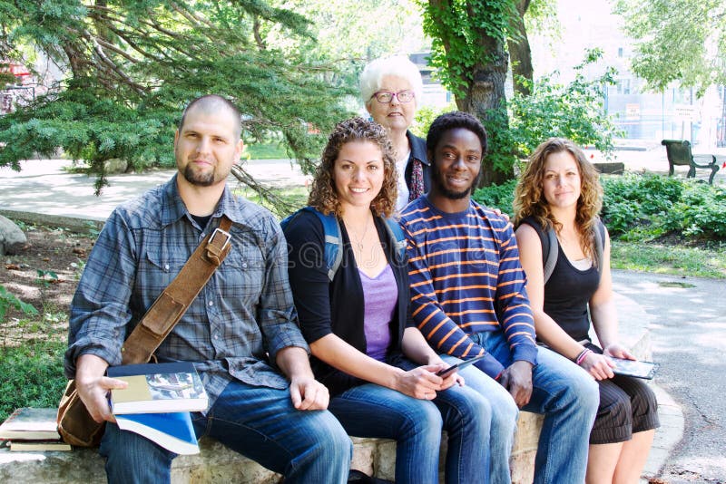 Four Students with Instructor Stock Photo - Image of adult, college ...