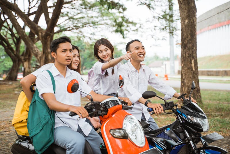 Four Students Riding Motorbikes on the Road Stock Image - Image of ...