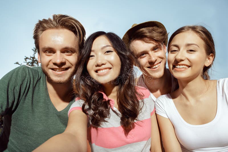 Four Students Smiling Warmly Stock Photos - Free & Royalty-Free Stock ...