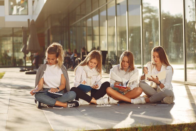 Four Students on a Student Campus with a Tablet Stock Image - Image of ...
