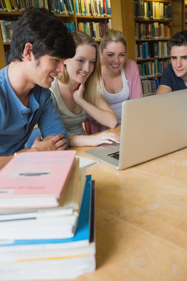 Four Students Studying in a Library Stock Image - Image of study, male ...