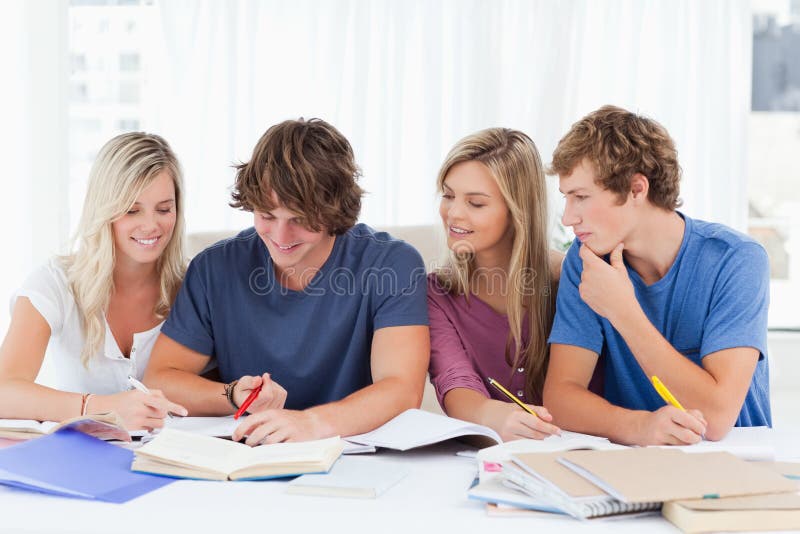 Four Students Trying To Get the Answer Stock Photo - Image of male ...