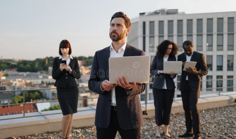 Four Successful Agents Using Portable Devices for Work Stock Image ...