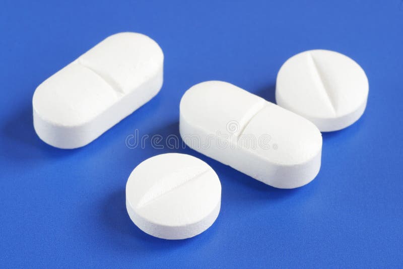 Four Tablets on a Blister stock photo. Image of unpacked - 40908640