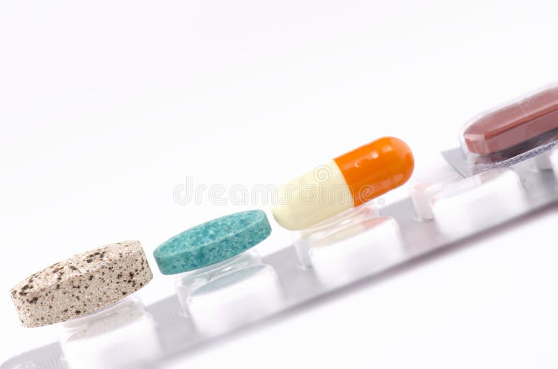 Four Tablets on a Blister stock photo. Image of unpacked - 40908640