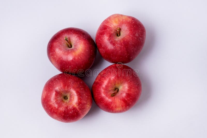 Four Tasty Red Apples on Blue Background Top View Horizontal Stock ...