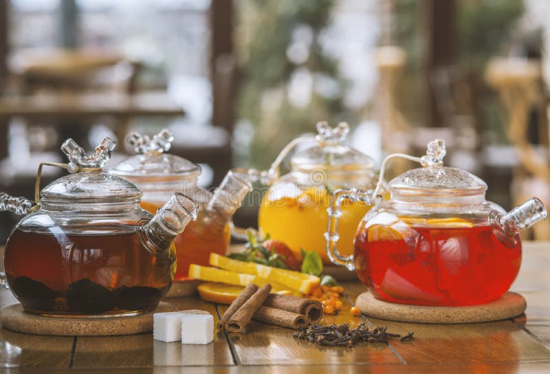 Teapots with Different Fruit Teas on the Table Stock Image - Image of ...
