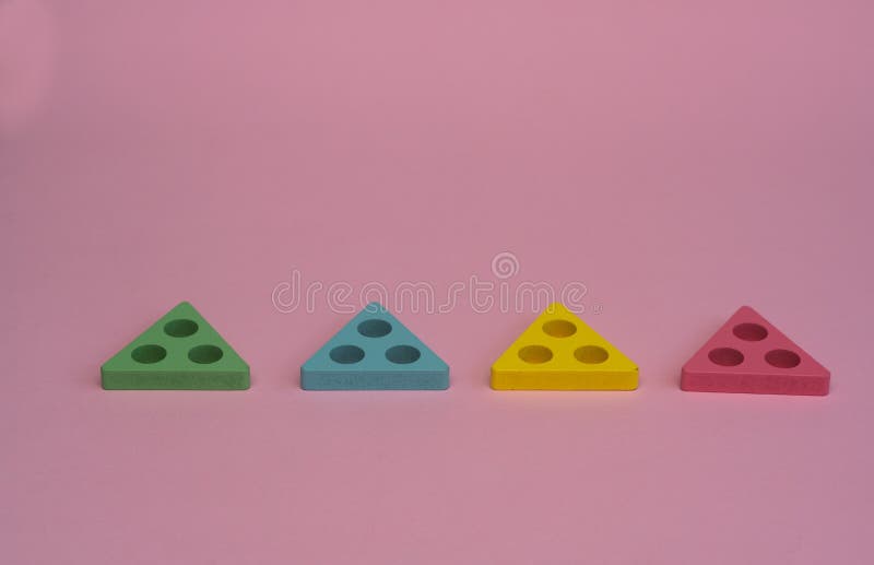 Four Triangles on a Pink Background. the Concept Stock Photo - Image of ...