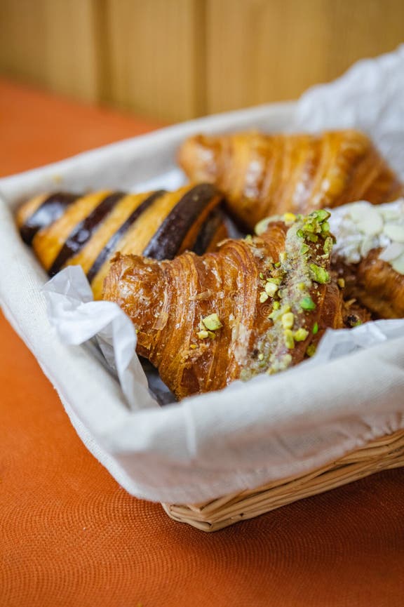 Four Types of Croissants in a Basket on a White Table Stock Image ...