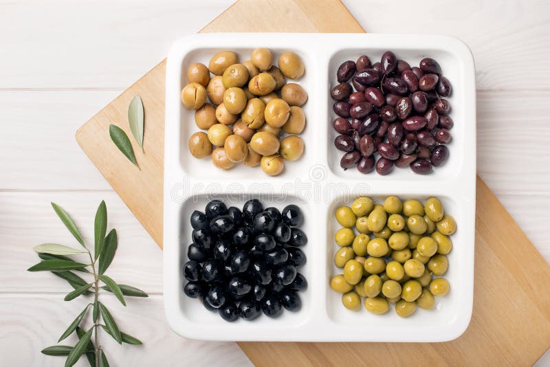 Four types of olives stock photo. Image of black, organic - 124972218