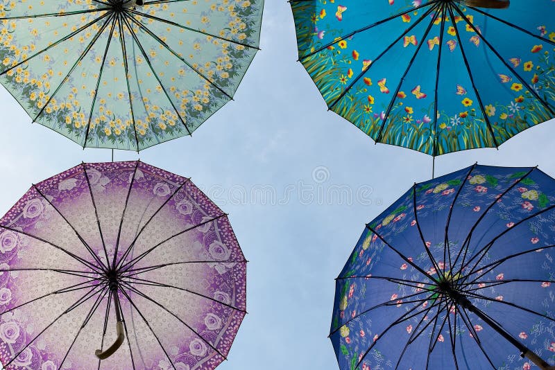 Four umbrellas stock image. Image of street, holiday - 159738425