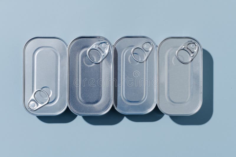 Four Unopened Tin Cans of Canned Food Stock Photo - Image of object ...