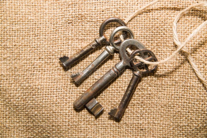 Four Very Old Keys Tied with a Rope on Old Cloth Stock Image - Image of ...