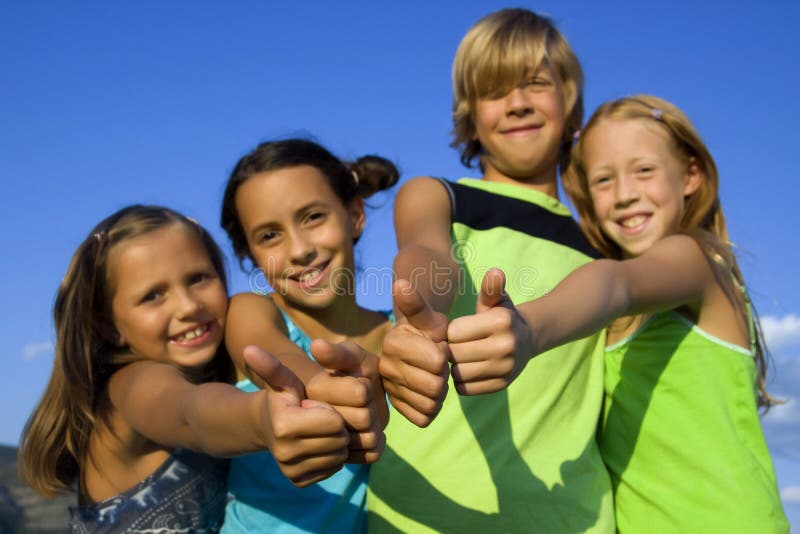Four young positive kids stock image. Image of people - 10915467