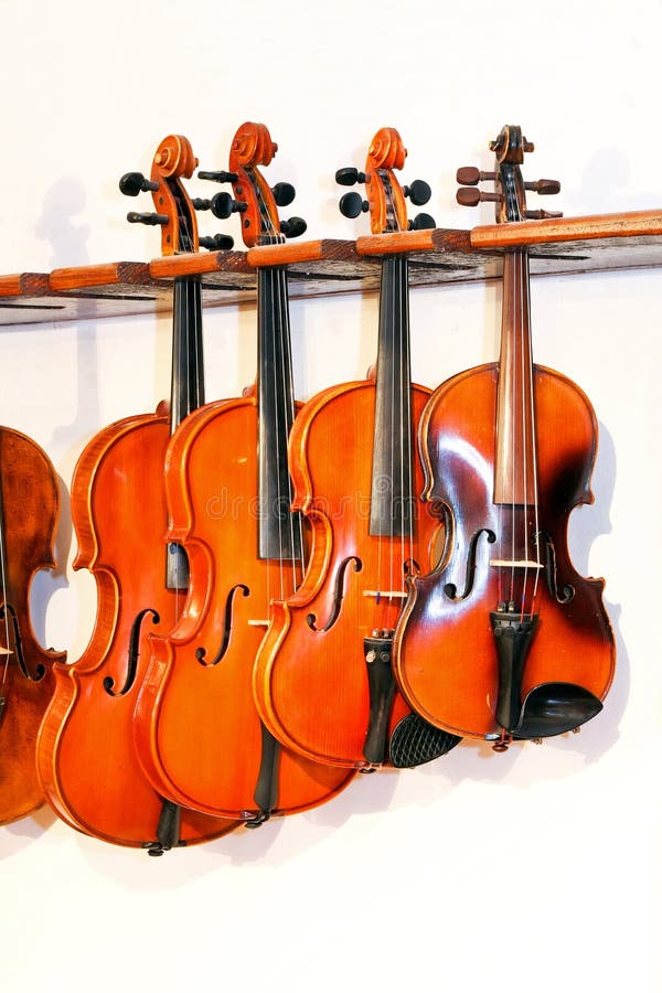 Four violins 2 stock image. Image of retro, style, classical - 9231081