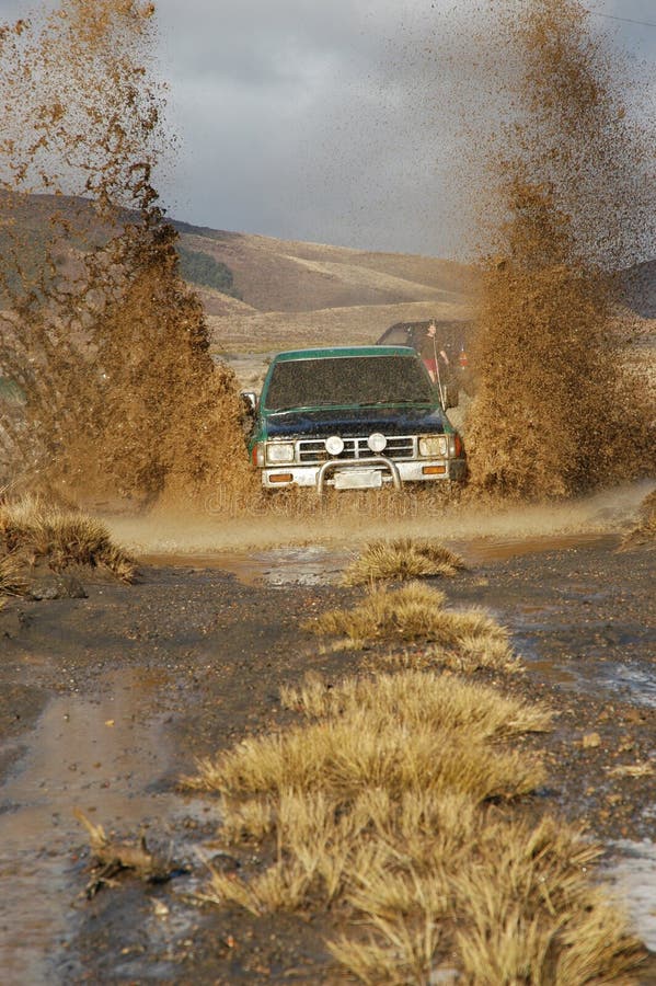 Four wheel driving stock photo. Image of wheel, puddle - 97386736