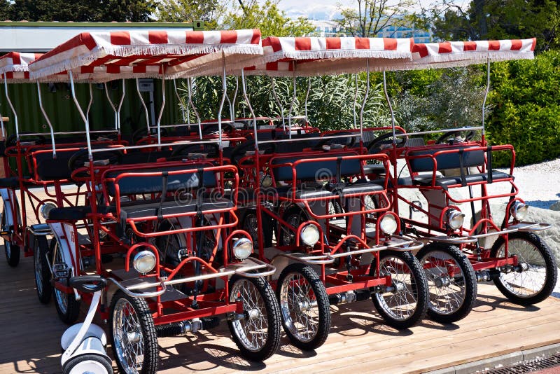 Rental Four Wheel Bikes in the Park Stock Photo - Image of ...