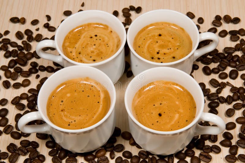 Four White Cups with Hot Coffee Stock Image - Image of heat, coffee ...