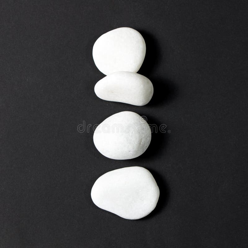 Four white pebbles stock photo. Image of peace, beginning - 88544762
