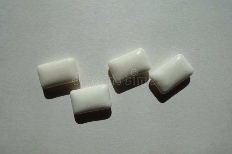Four White Pieces of Chewing Gum from Above Stock Image - Image of care ...