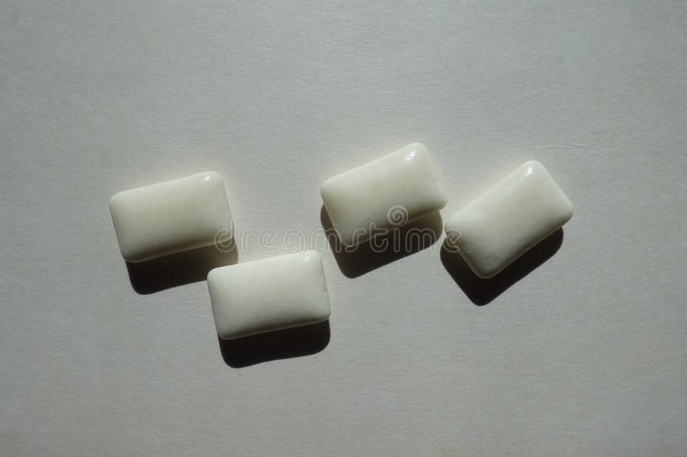 Four White Pieces of Chewing Gum from Above Stock Image - Image of care ...