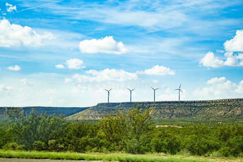 Four Windmills on a Lone Plateau in Texas Stock Image - Image of ...