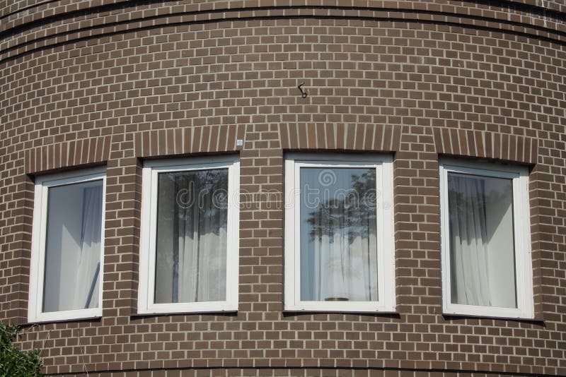 Four Windows of a Brick Building Stock Image - Image of architecture ...