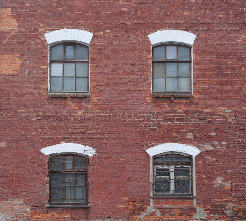 Four Windows in the Old Red Brick Wall Stock Photo - Image of ...