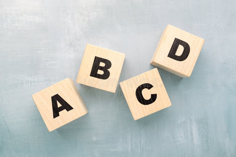 Four Wooden Blocks with Letters a B C D on Light Background ...