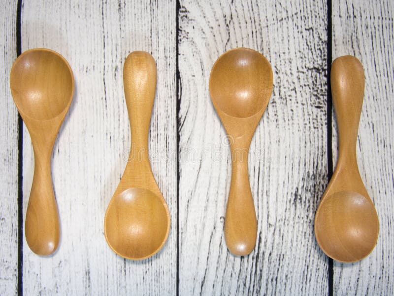 Four Wooden Teaspoons Wooden Table Stock Photos - Free & Royalty-Free ...