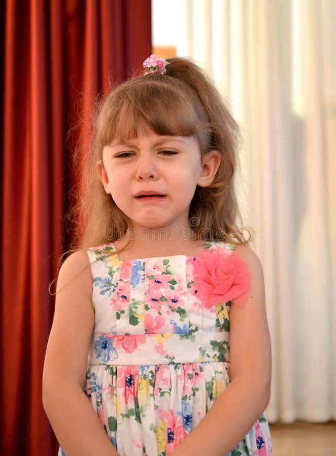 The Four-year-old Girl Cries in the Kindergarten Hall Stock Photo ...