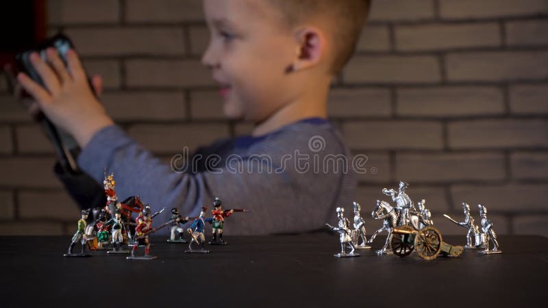 Video of Four Year Old Kid Photographing Tin Soldiers Stock Video ... Video of Four Year Old Kid Photographing Tin Soldiers Stock Video ...
