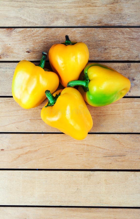 Four Yellow Bell Peppers on Table Stock Image - Image of healthy, meal ...