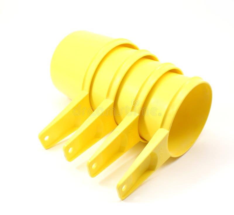 Yellow Measuring Cups stock image. Image of utensil, utensils - 10335621