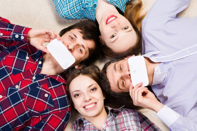 Four Young Men Lie Together Stock Photo - Image of card, friendship ...